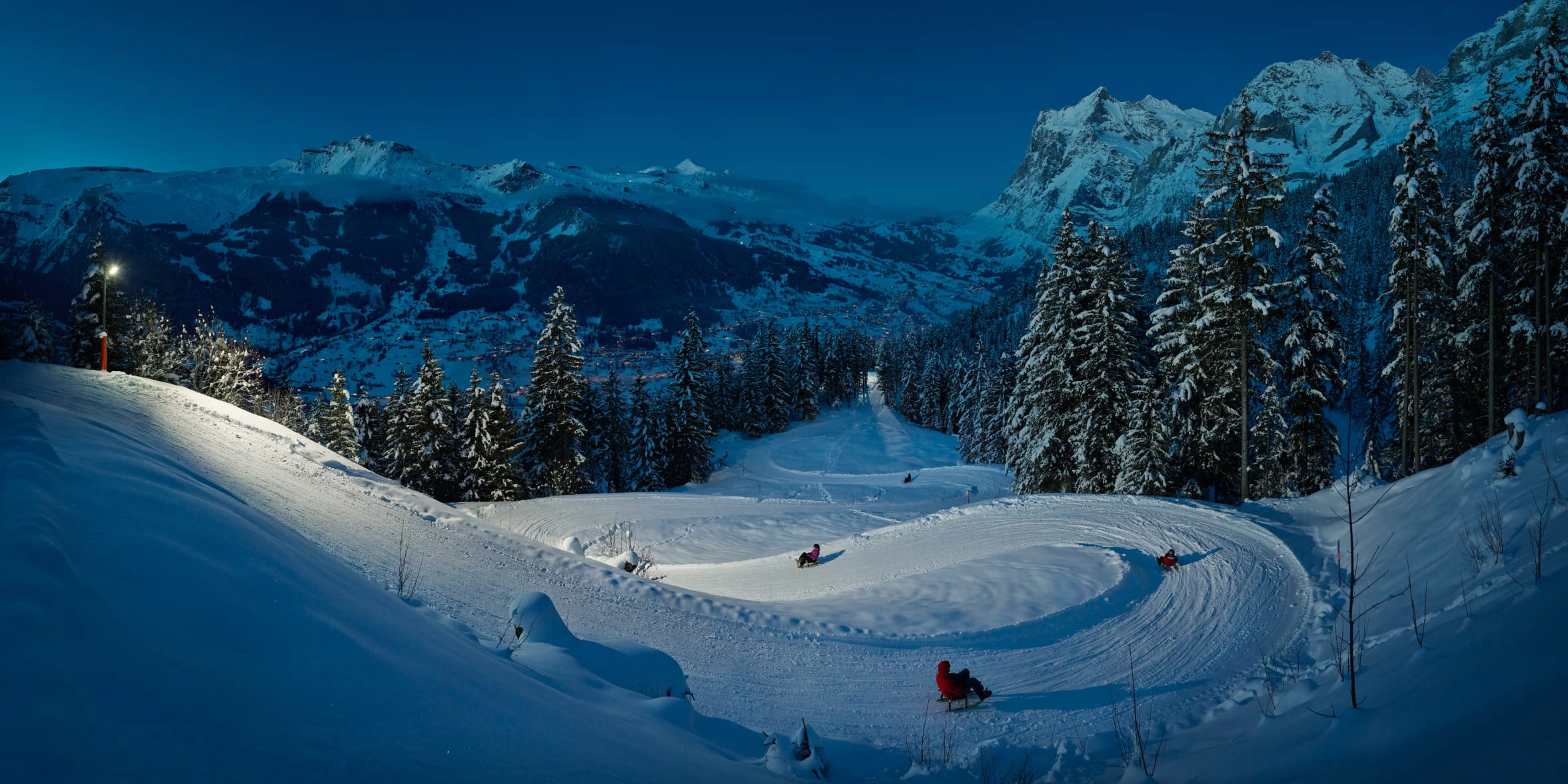 Night sledding in Switzerland